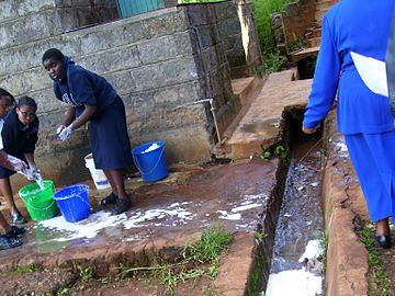 Washing water into drains - Hooi Khaw & Su